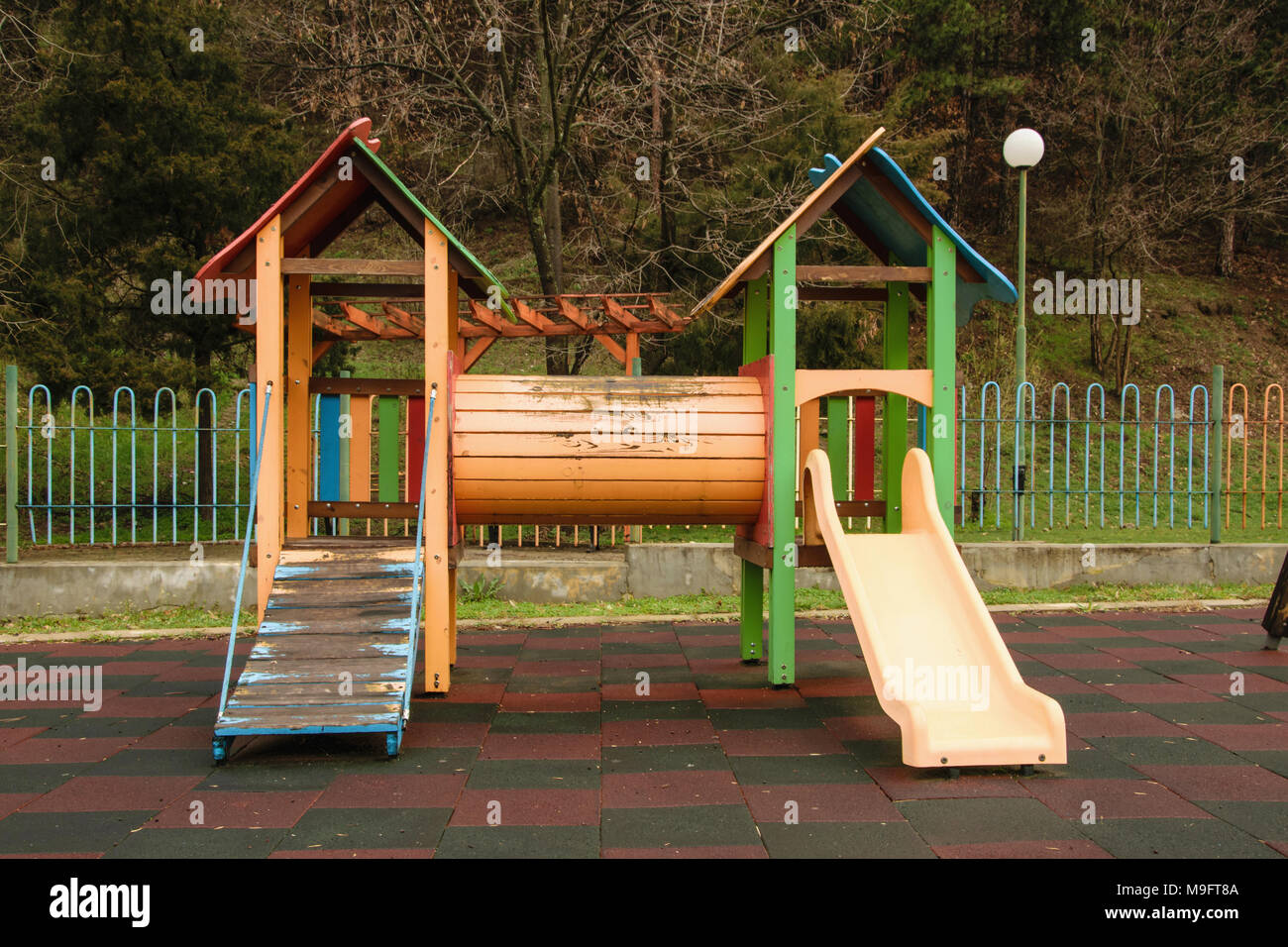 Colorful children playground in the green area Stock Photo - Alamy