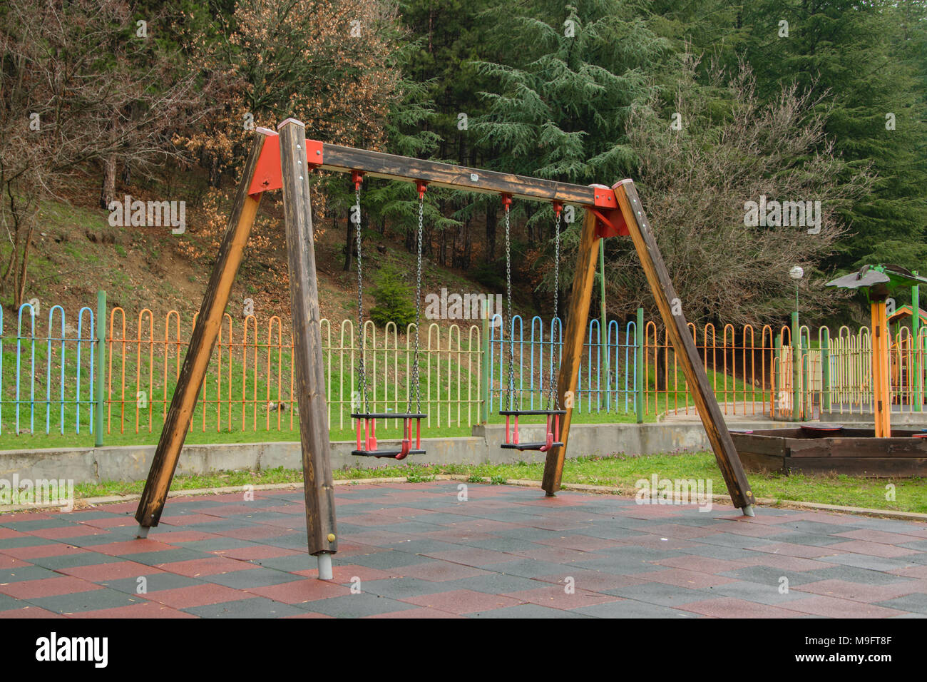Colorful children playground in the green area Stock Photo - Alamy