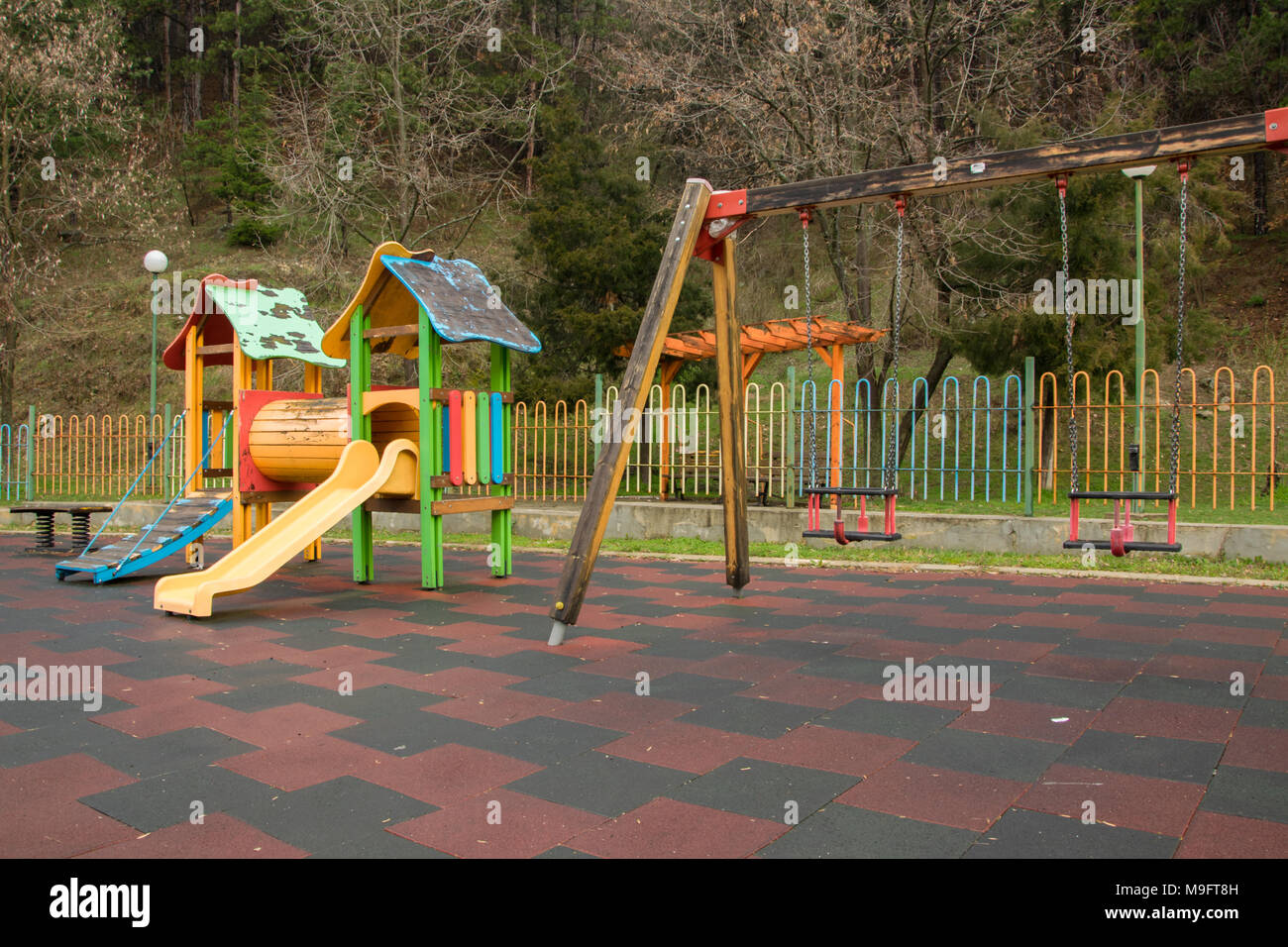 Colorful children playground in the green area Stock Photo - Alamy