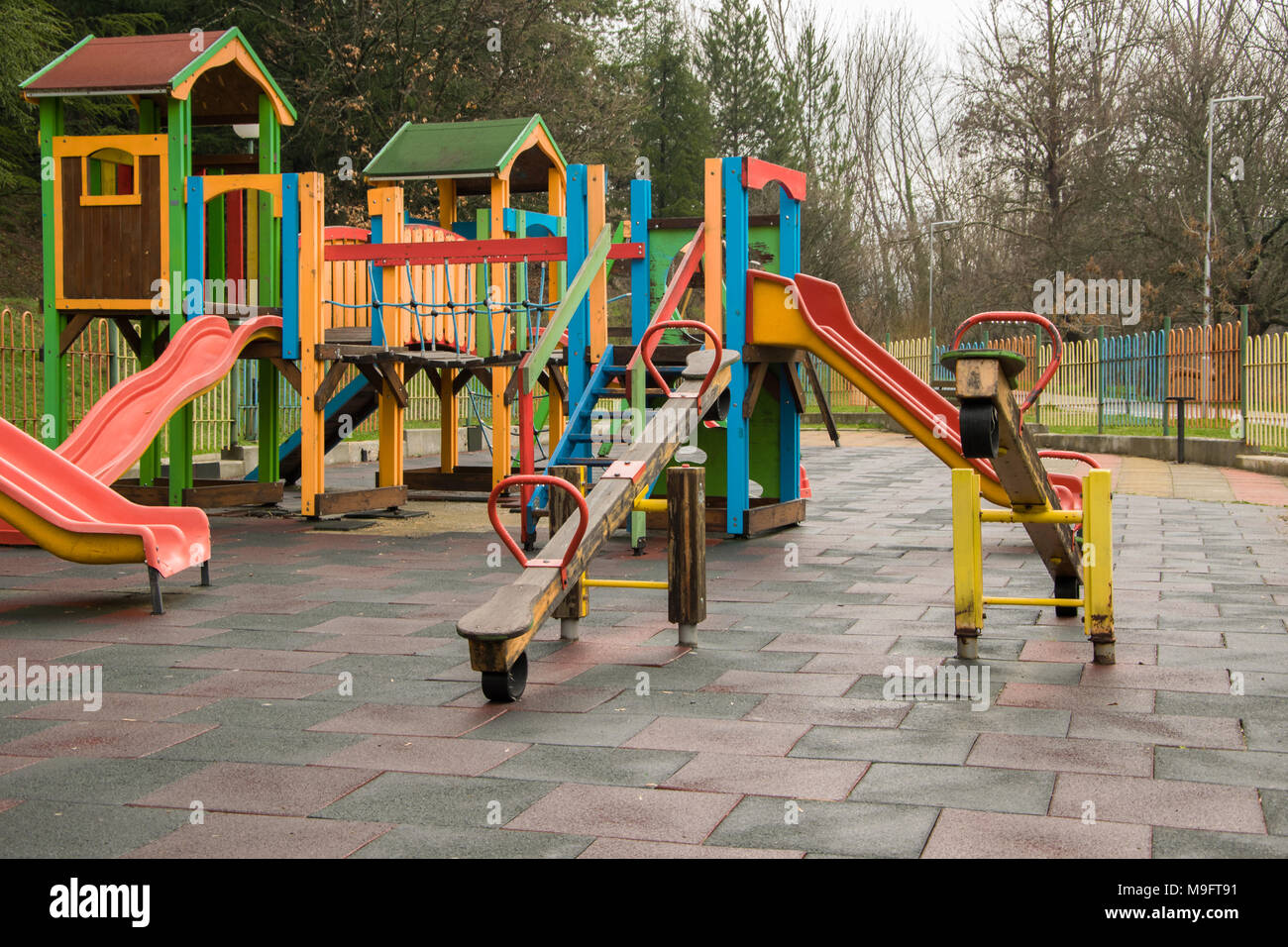 Colorful children playground in the green area Stock Photo - Alamy