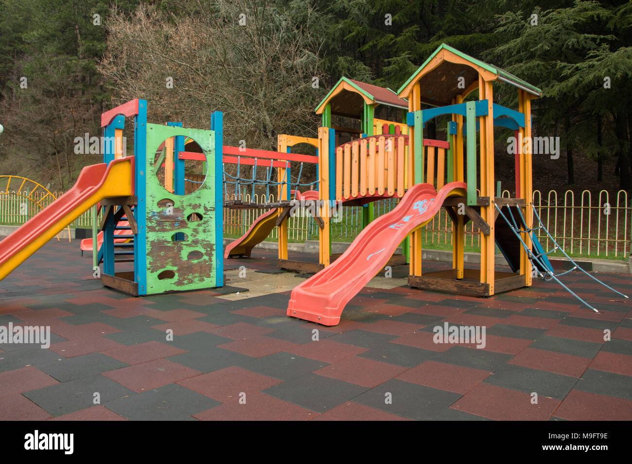 Colorful children playground in the green area Stock Photo - Alamy