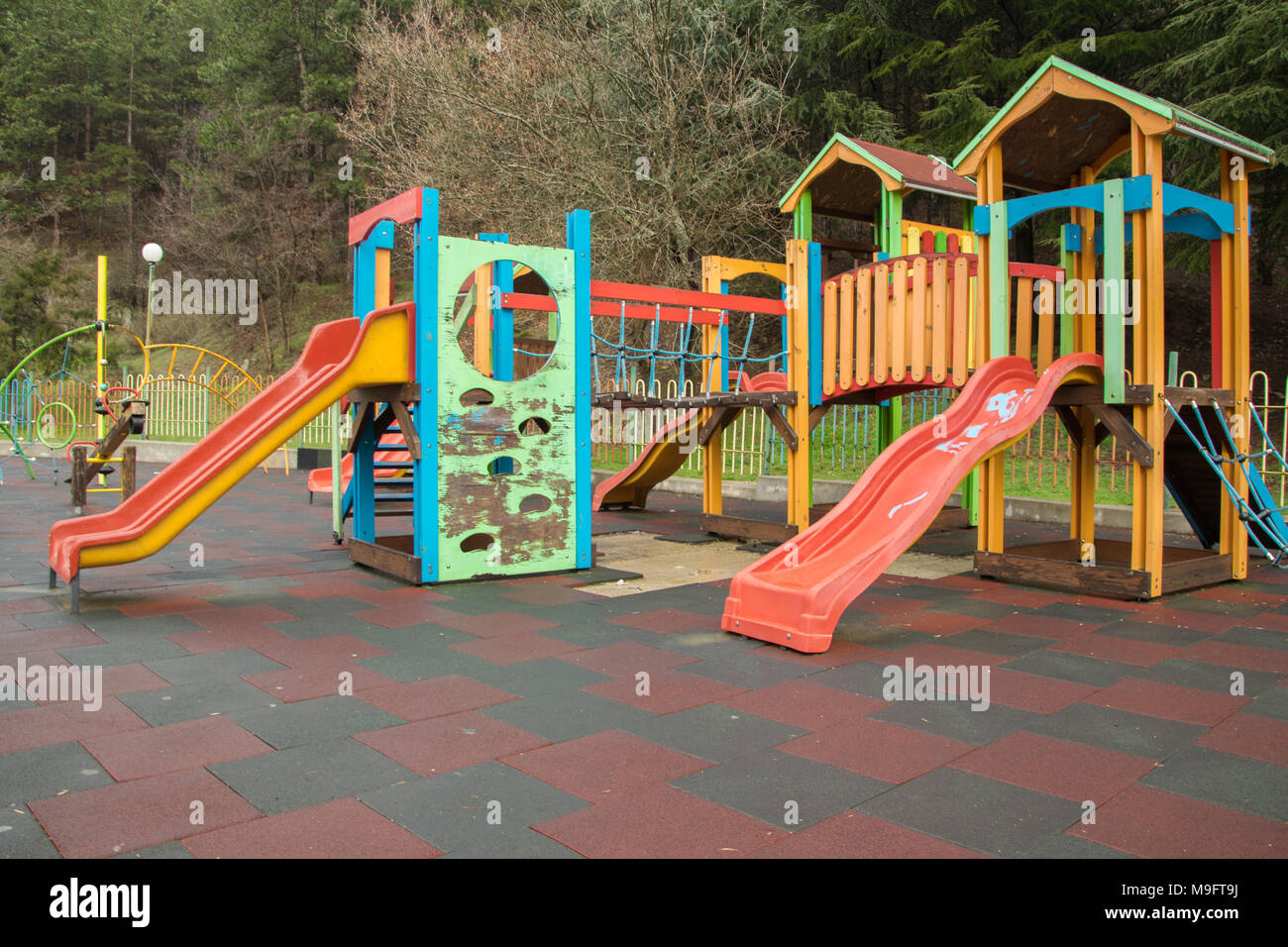 Colorful children playground in the green area Stock Photo - Alamy