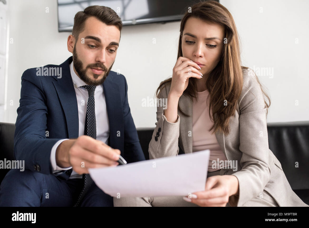 Modern Business People Reading Documents Stock Photo - Alamy