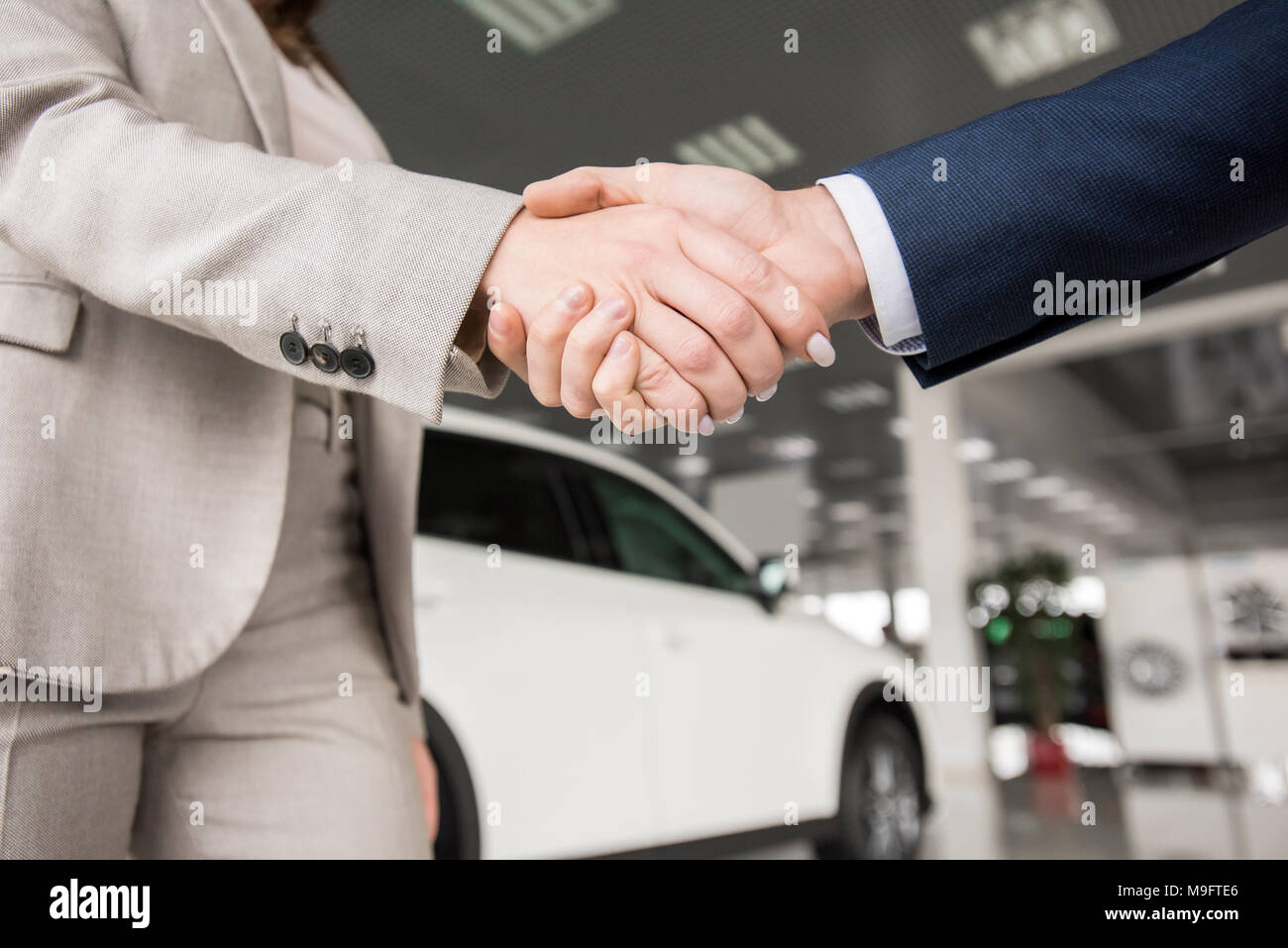 Woman man handshake close hi-res stock photography and images - Alamy