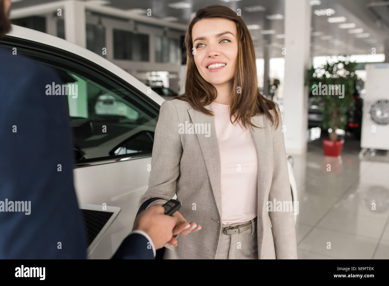 Beautiful Woman Buying Car Stock Photo - Alamy