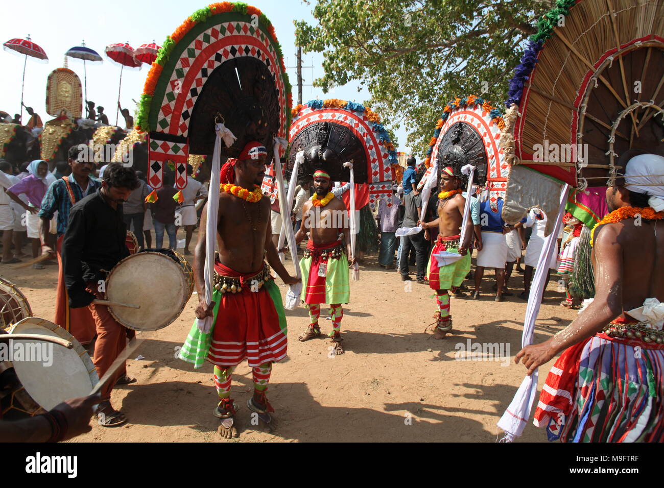 temple festival in kerala,with procession of kuthiravela or motif ...