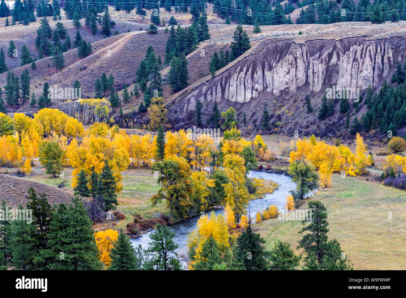 42,653.07349 landscape with twisting creek colorful valley meadow ...