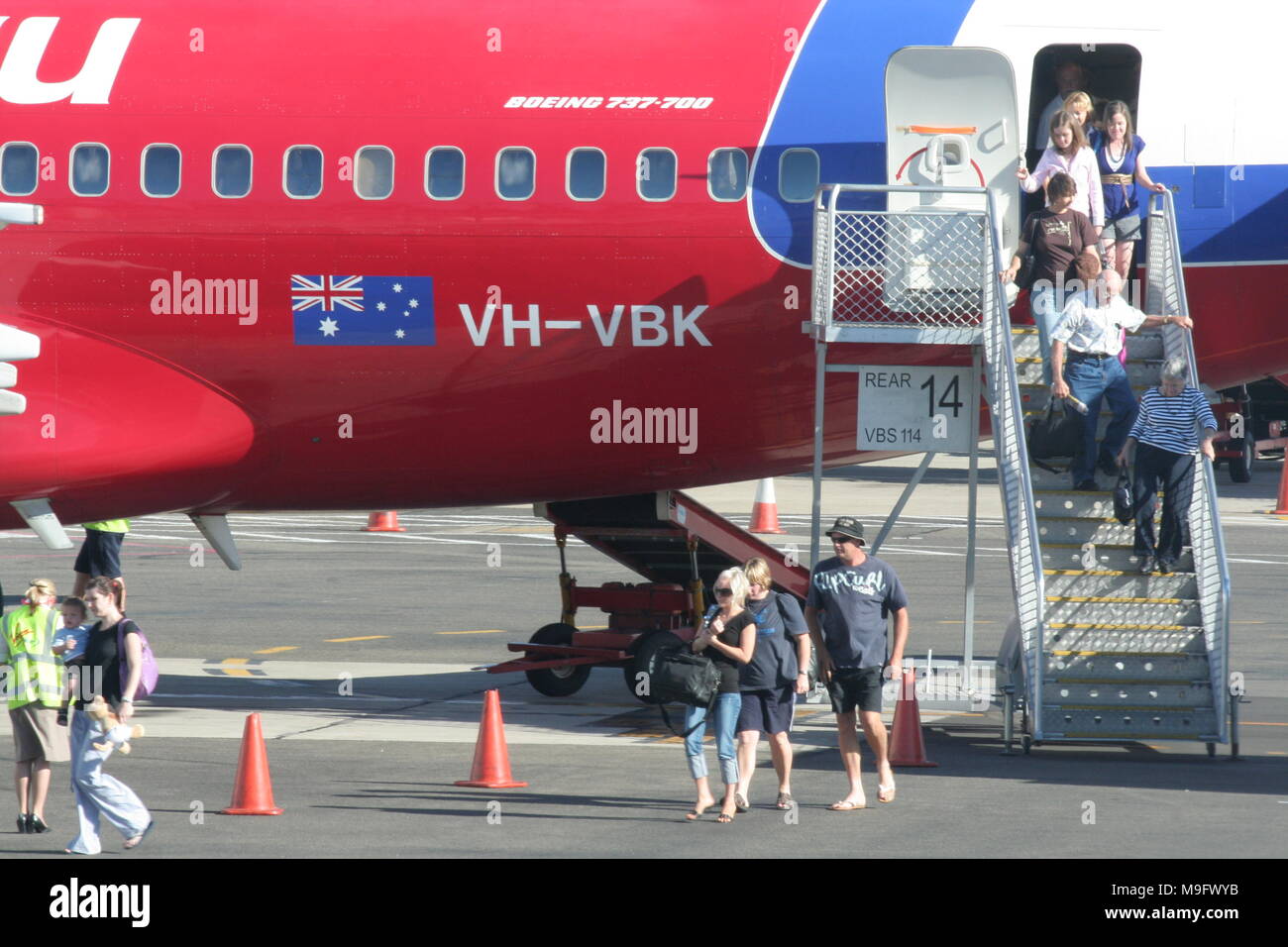 Passenger disembarking from Virgin plane., Sydney Airport, Australia ...