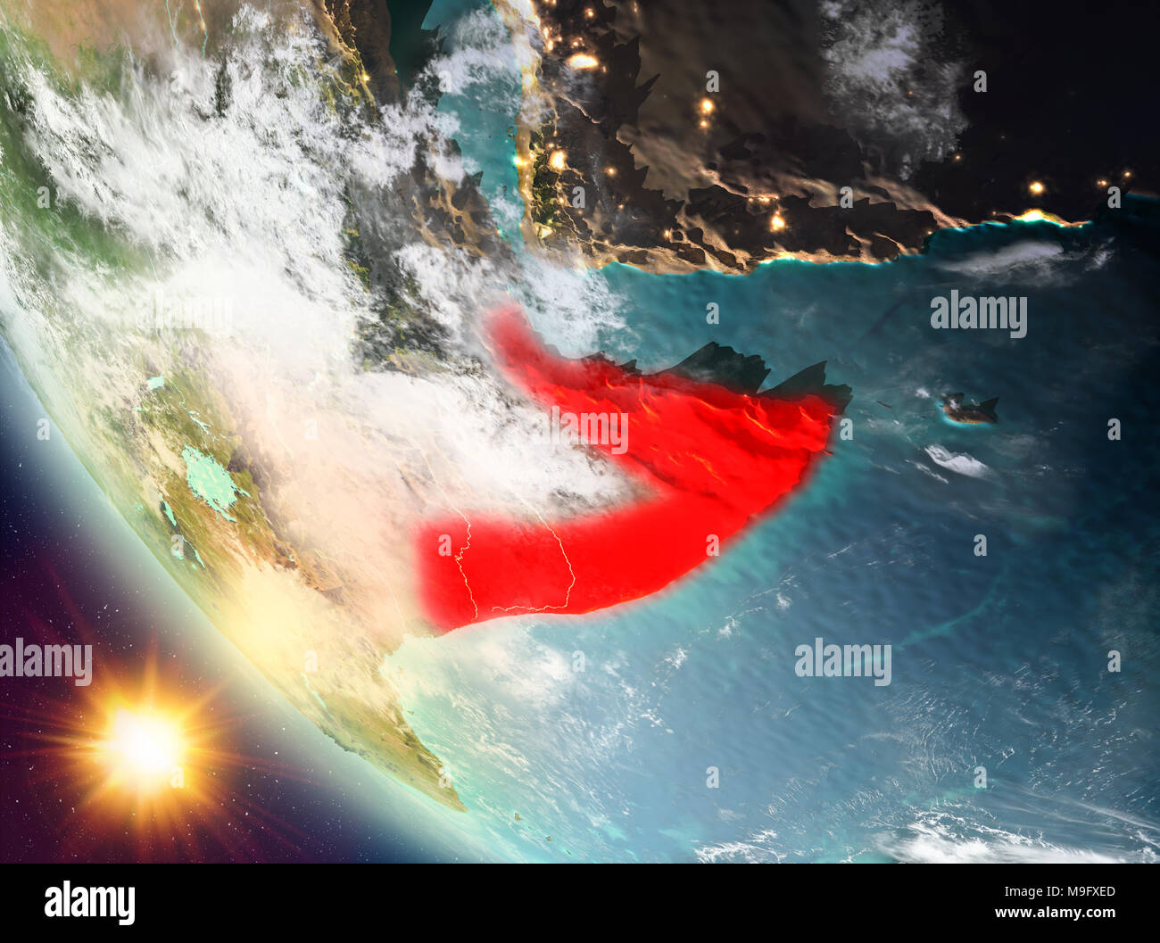 Somalia during sunset highlighted in red on planet Earth with clouds ...