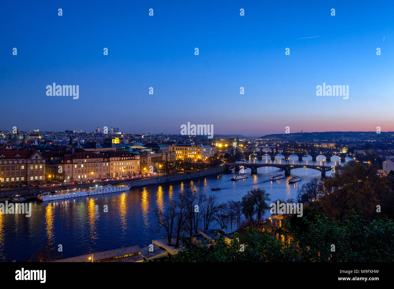 Panorama of the old part of Prague from the Letna park at dusk ...