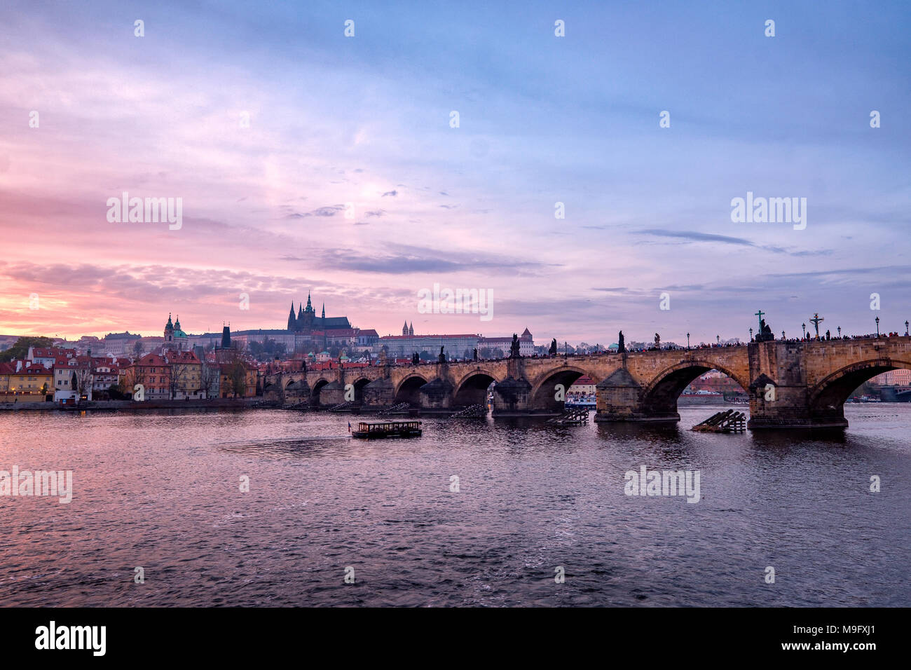 Scenic view of bridges on the Vltava river and historical center of ...