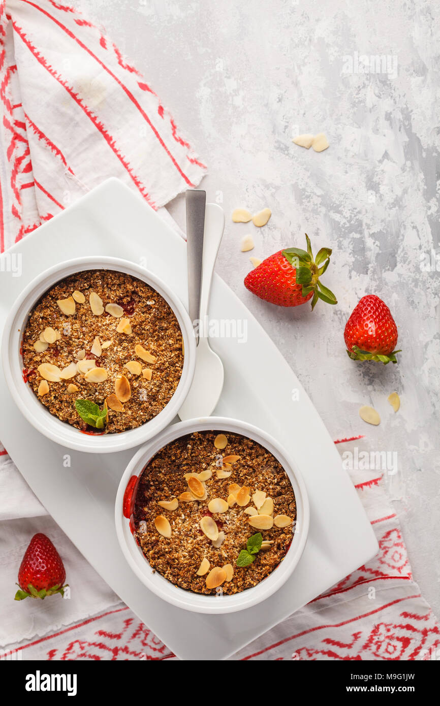 Homemade breakfast strawberry crumble. Mini berry cake with strawberry ...