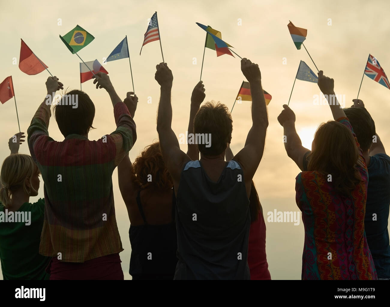 Concept of international friendship. People with different flags ...