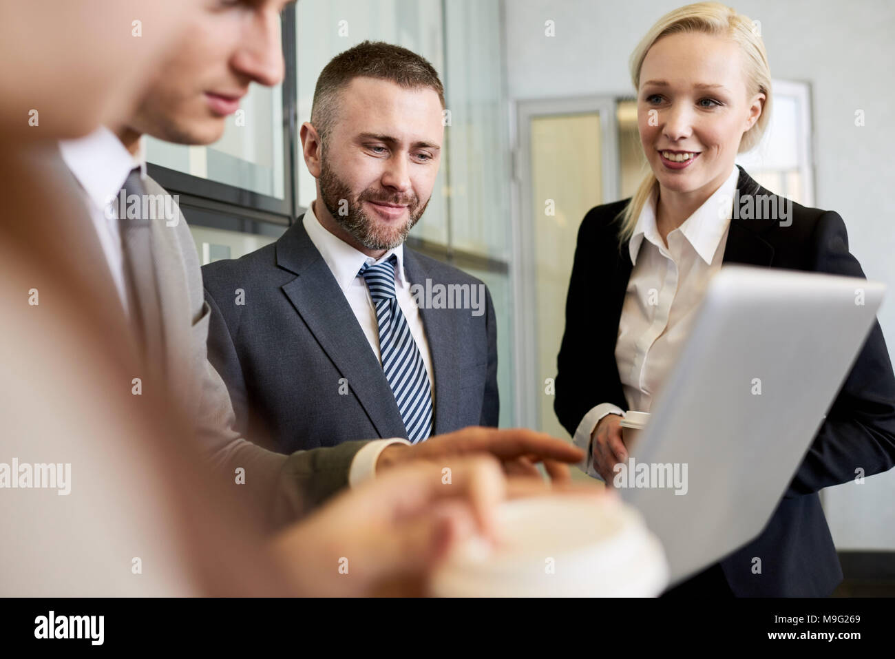 Group successful people holding hi-res stock photography and images - Alamy