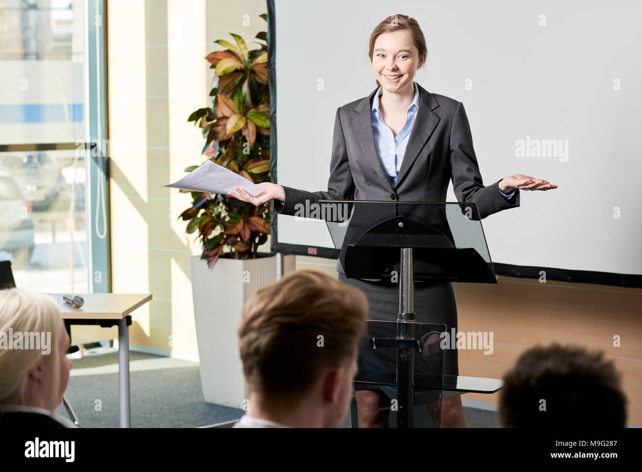 Young Businesswoman Giving Speech Stock Photo - Alamy
