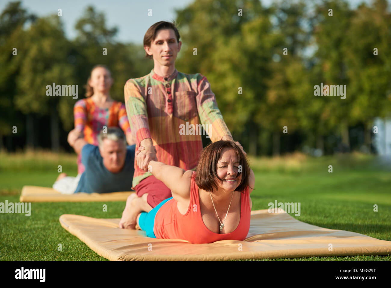 Exercise and stretching class. Thai Yoga Massage Stock Photo - Alamy