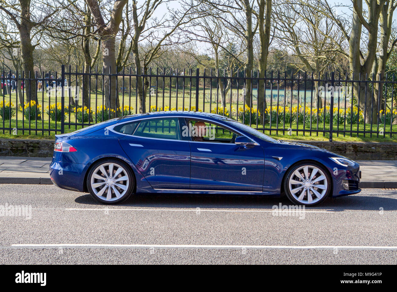 Tesla electric car vehicle road battery zero emissions recharge ...