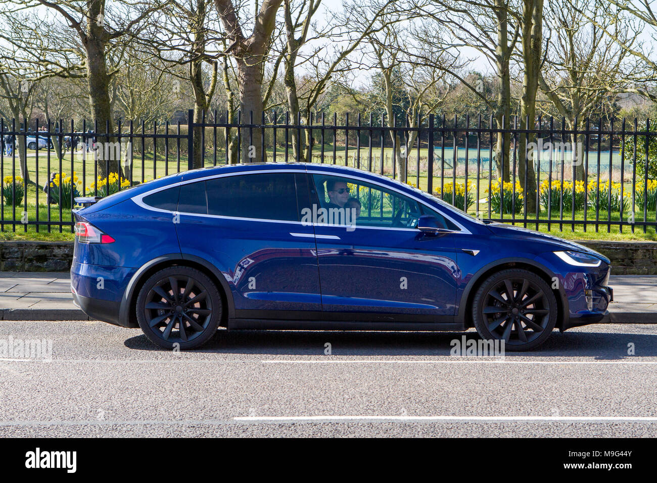 Tesla electric car vehicle road battery zero emissions recharge ...