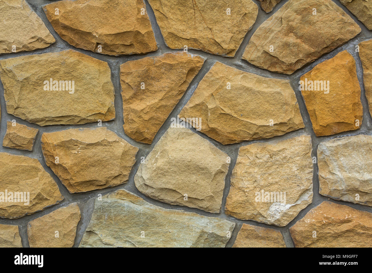 Different sizes of sand stones. Stone wall pattern background Stock ...