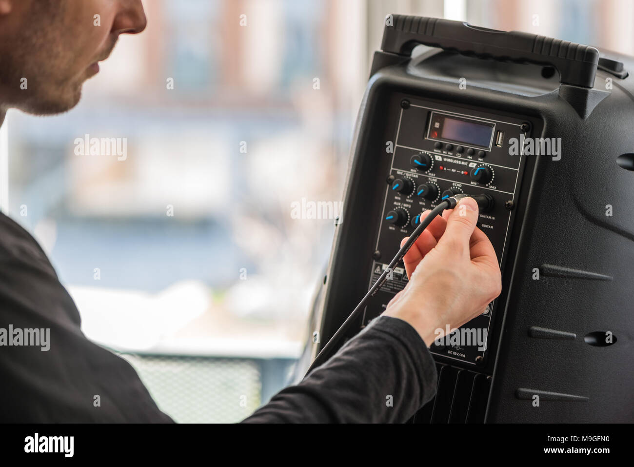 Plugging in hi-res stock photography and images - Alamy