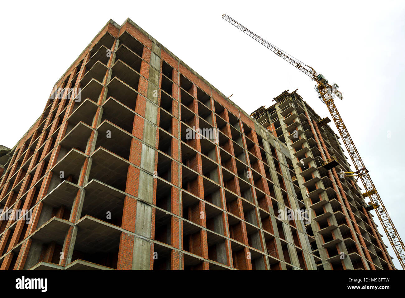 Ground view of a new modern residential house building under ...