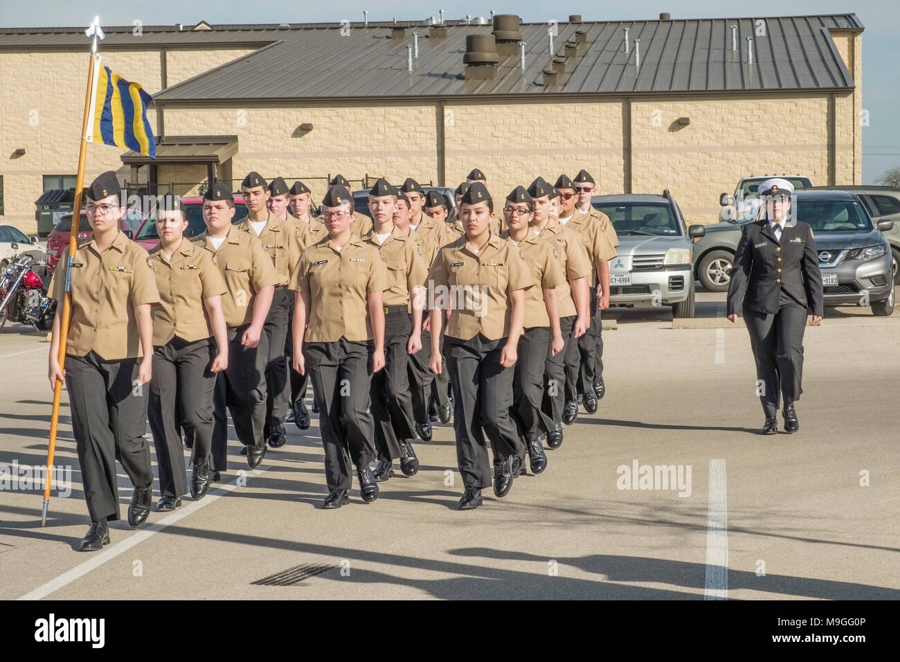 US Navy NJROTC high school cadets in marching drill formation during ...