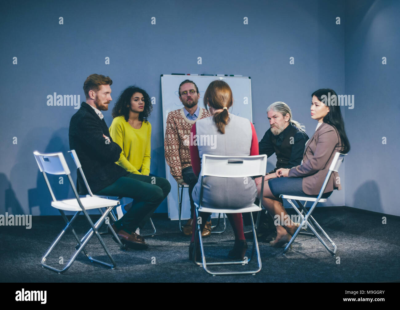 Large group of people having a counseling session Stock Photo - Alamy