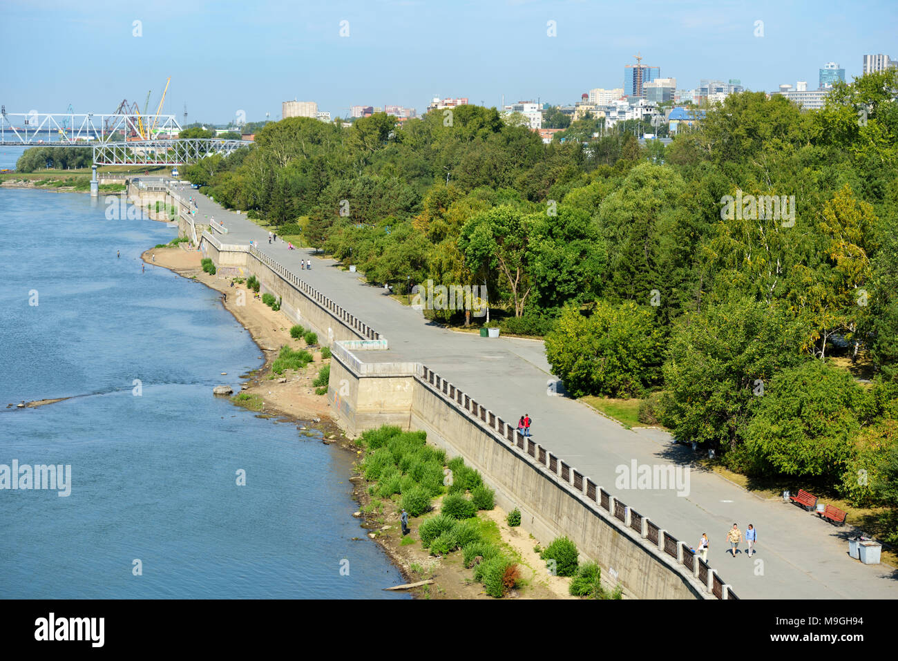 Novosibirsk, Russia - August 24, 2014: People walking on the embankment ...