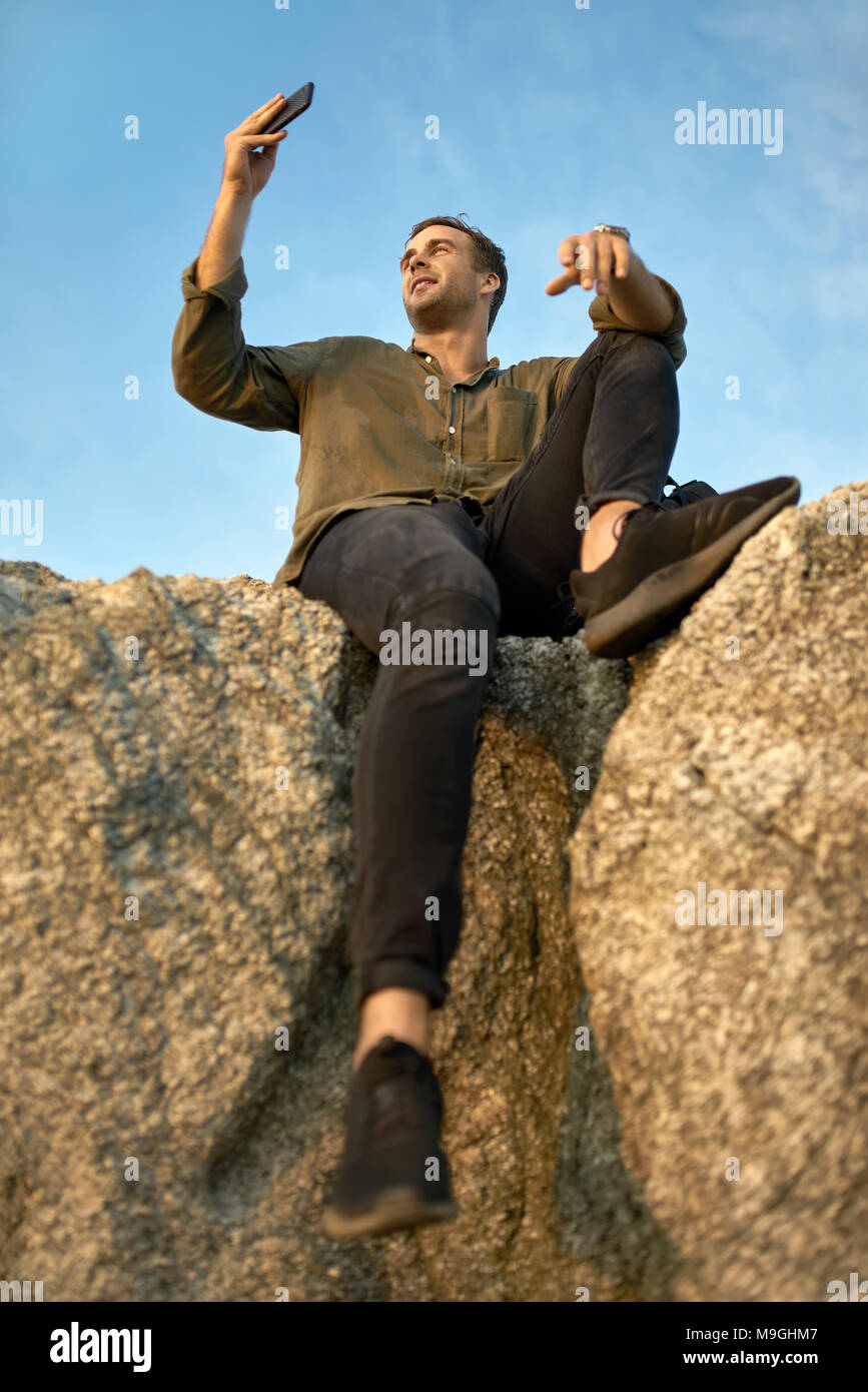 Young man traveler making hi-res stock photography and images - Alamy