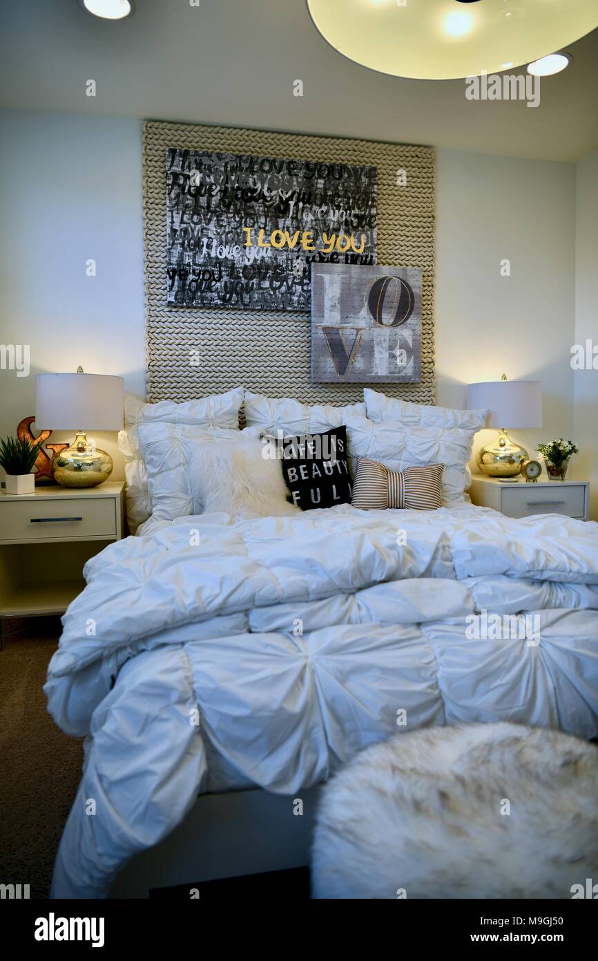 View of modern bedroom with bed inside decorated home Stock Photo - Alamy