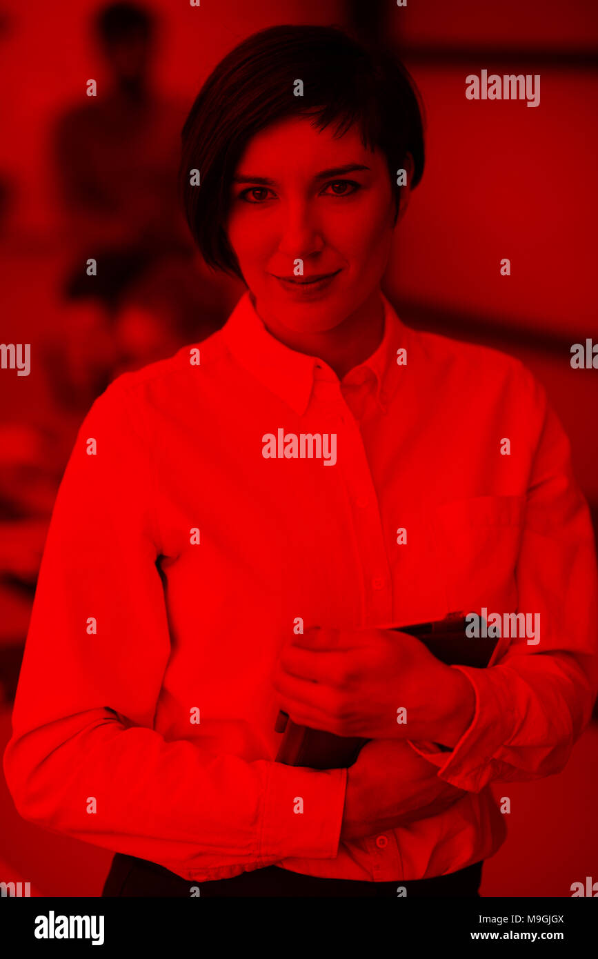 young hispanic businesswoman portrait with tablet computer at modern ...