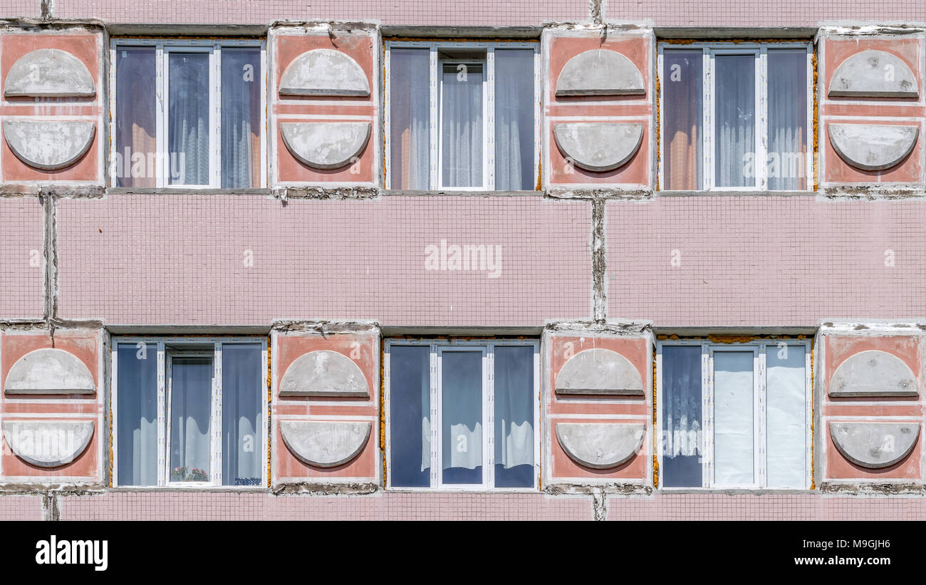 Sphere shapes on a soviet era building in red & white Stock Photo - Alamy