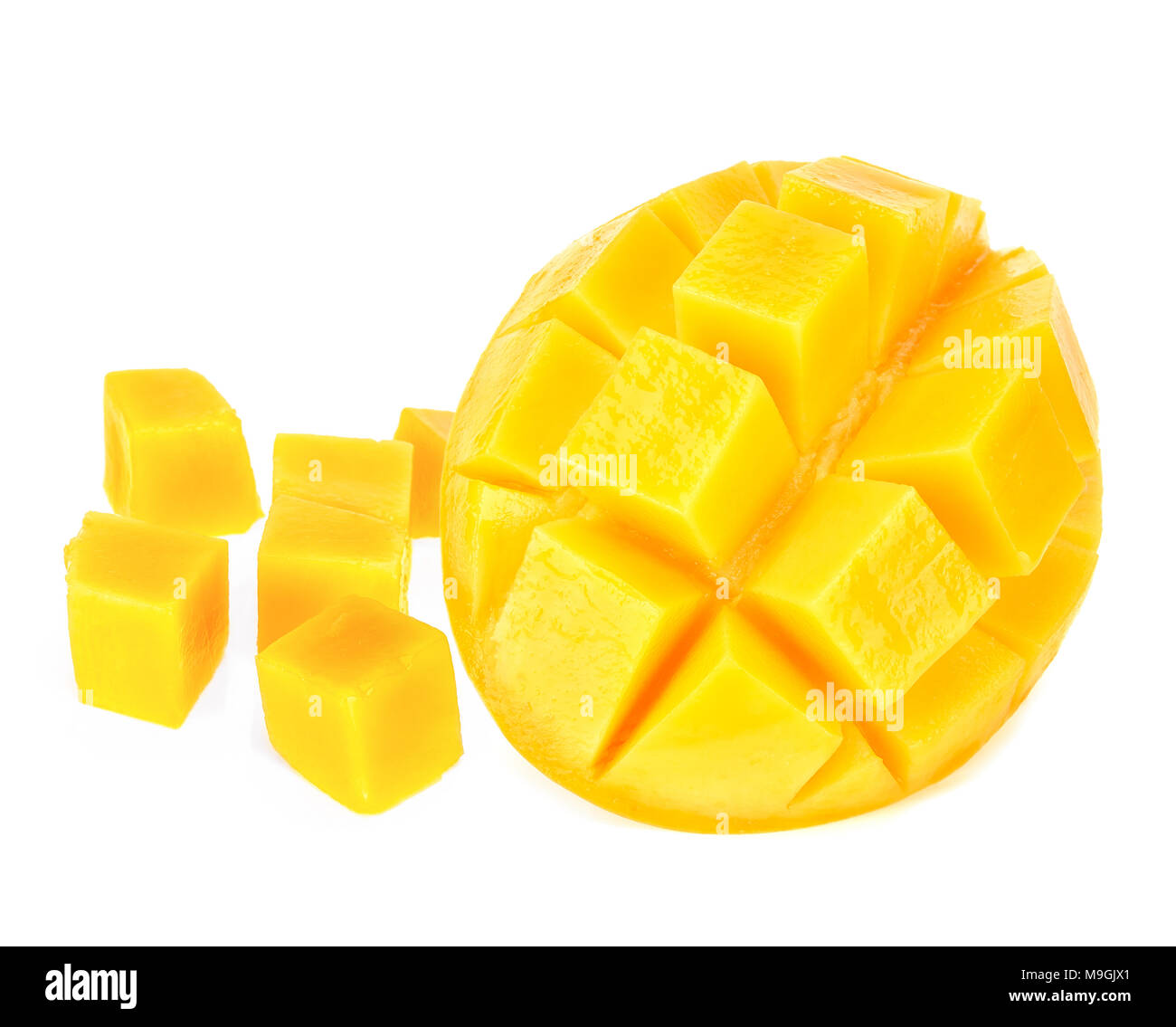 Cube of yellow mango isolated on white background Stock Photo - Alamy