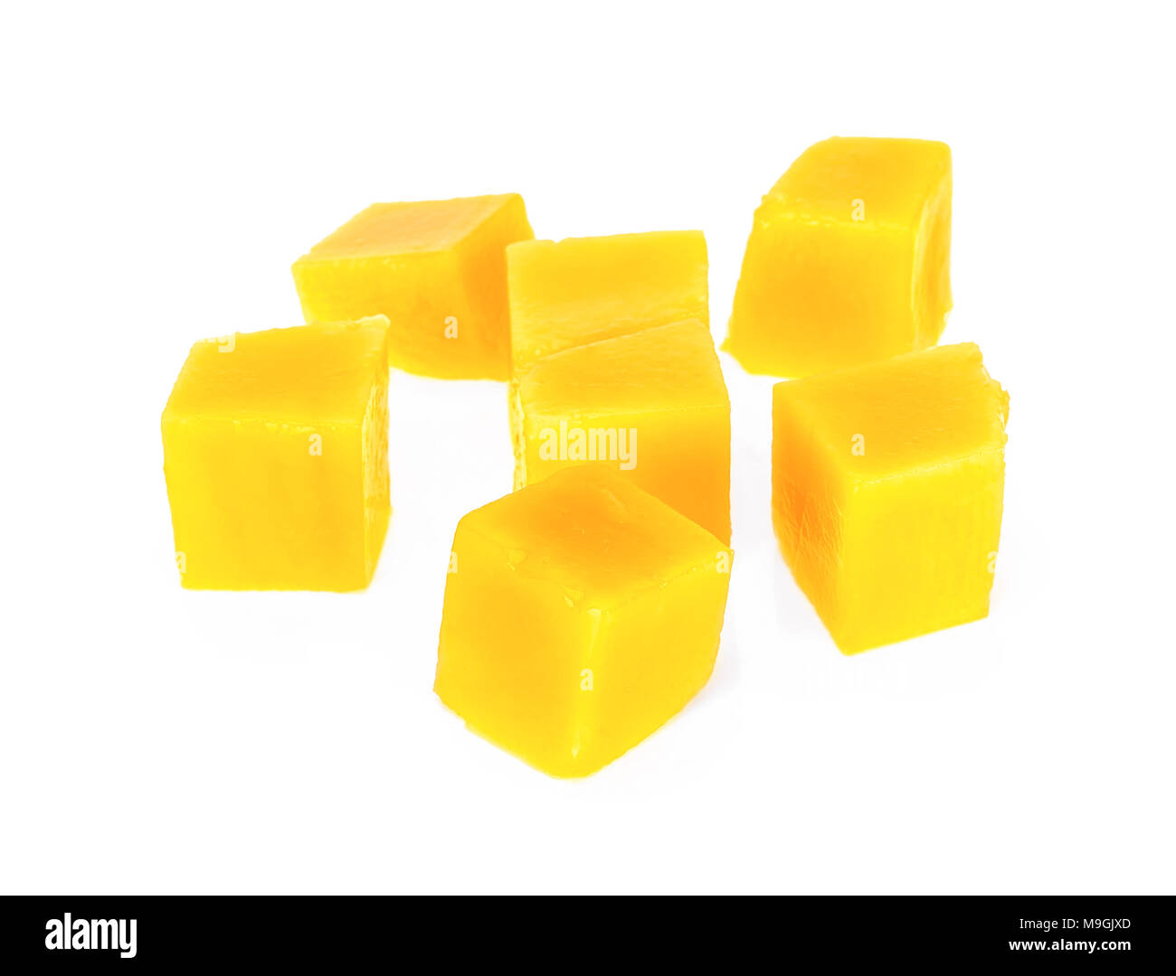 Cube of yellow mango isolated on white background Stock Photo - Alamy