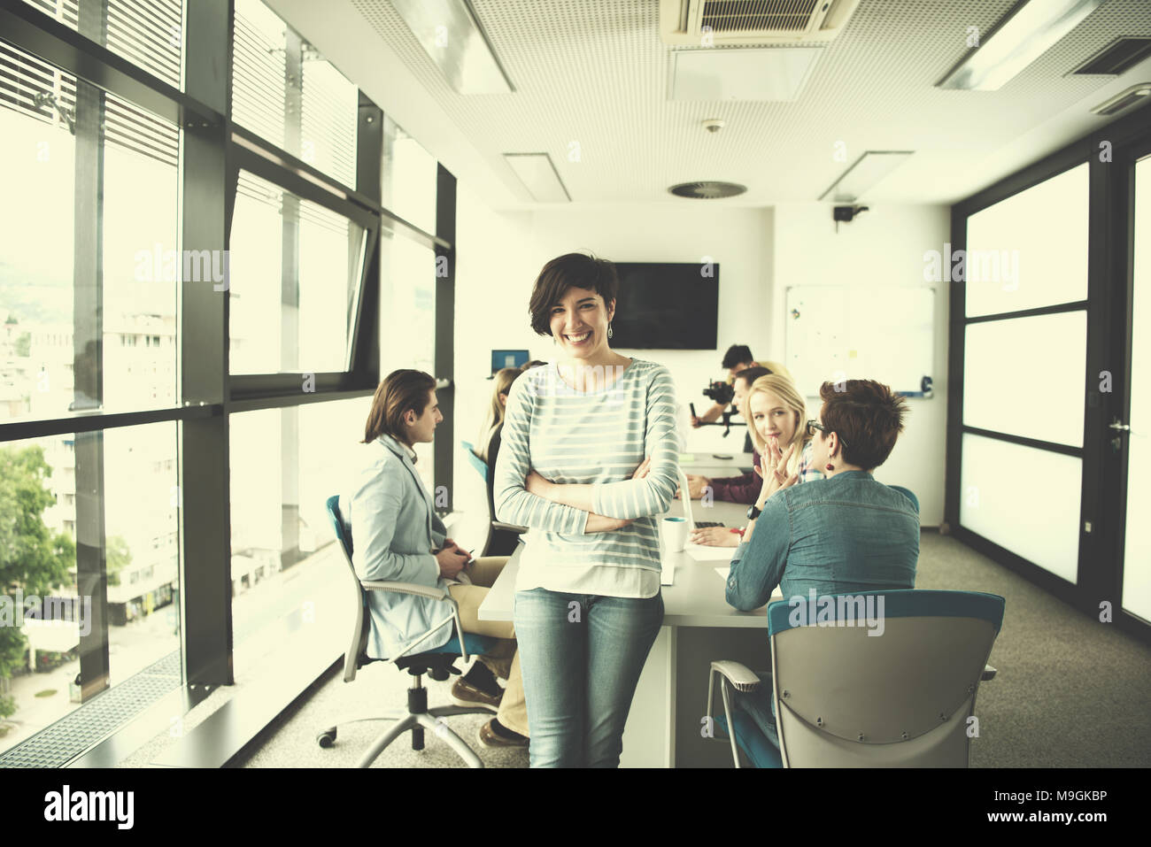 Portrait Of Successful Businesswoman Entrepreneur At Busy startup ...
