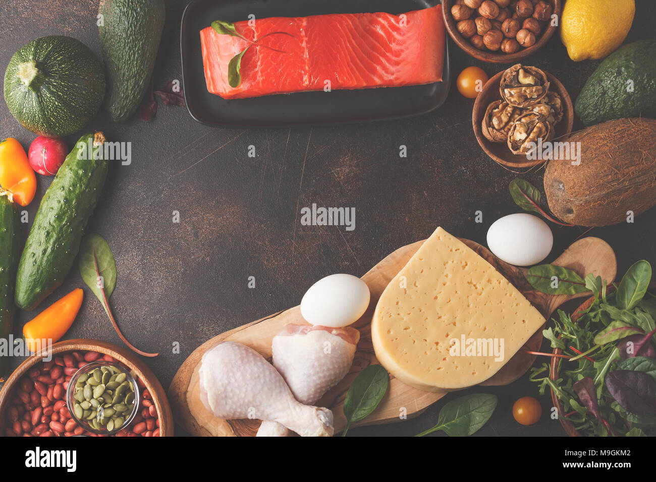 Keto diet concept. Balanced low-carb food background. Vegetables, fish ...