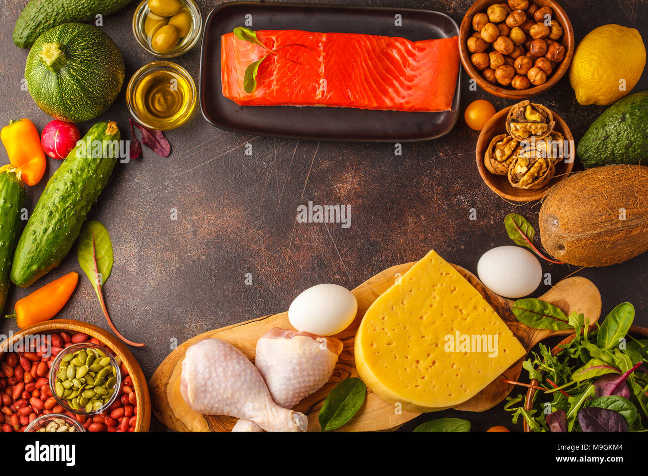 Keto diet concept. Balanced low-carb food background. Vegetables, fish ...