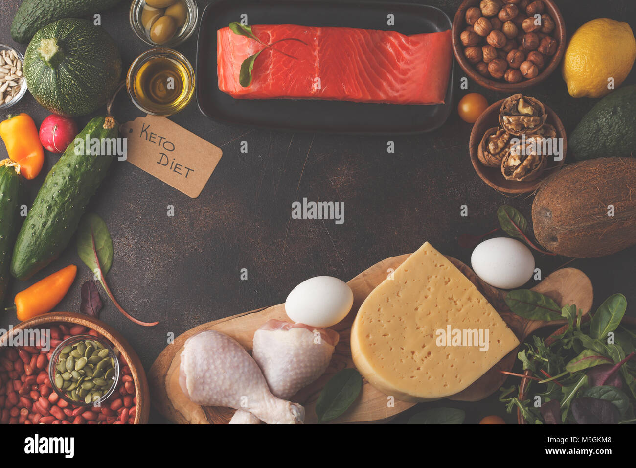 Keto diet concept. Balanced low-carb food background. Vegetables, fish ...