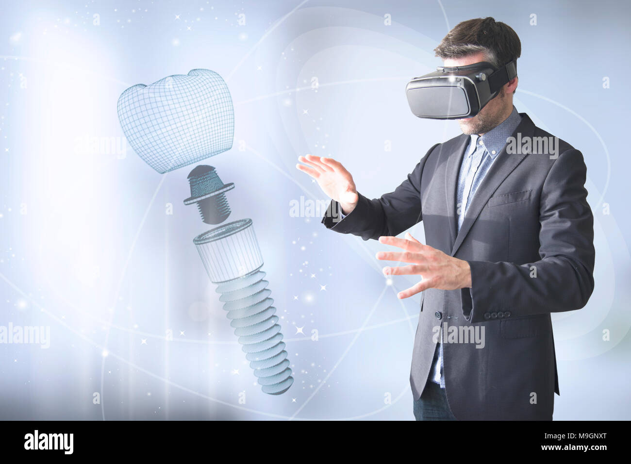man with vr glasses designing a dental prosthesis Stock Photo - Alamy