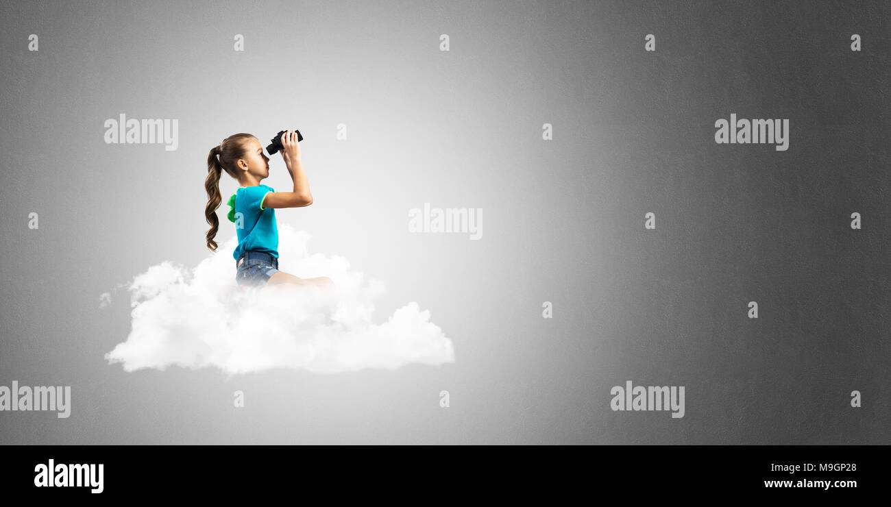 Cute kid girl sitting on cloud and looking in binoculars Stock Photo ...
