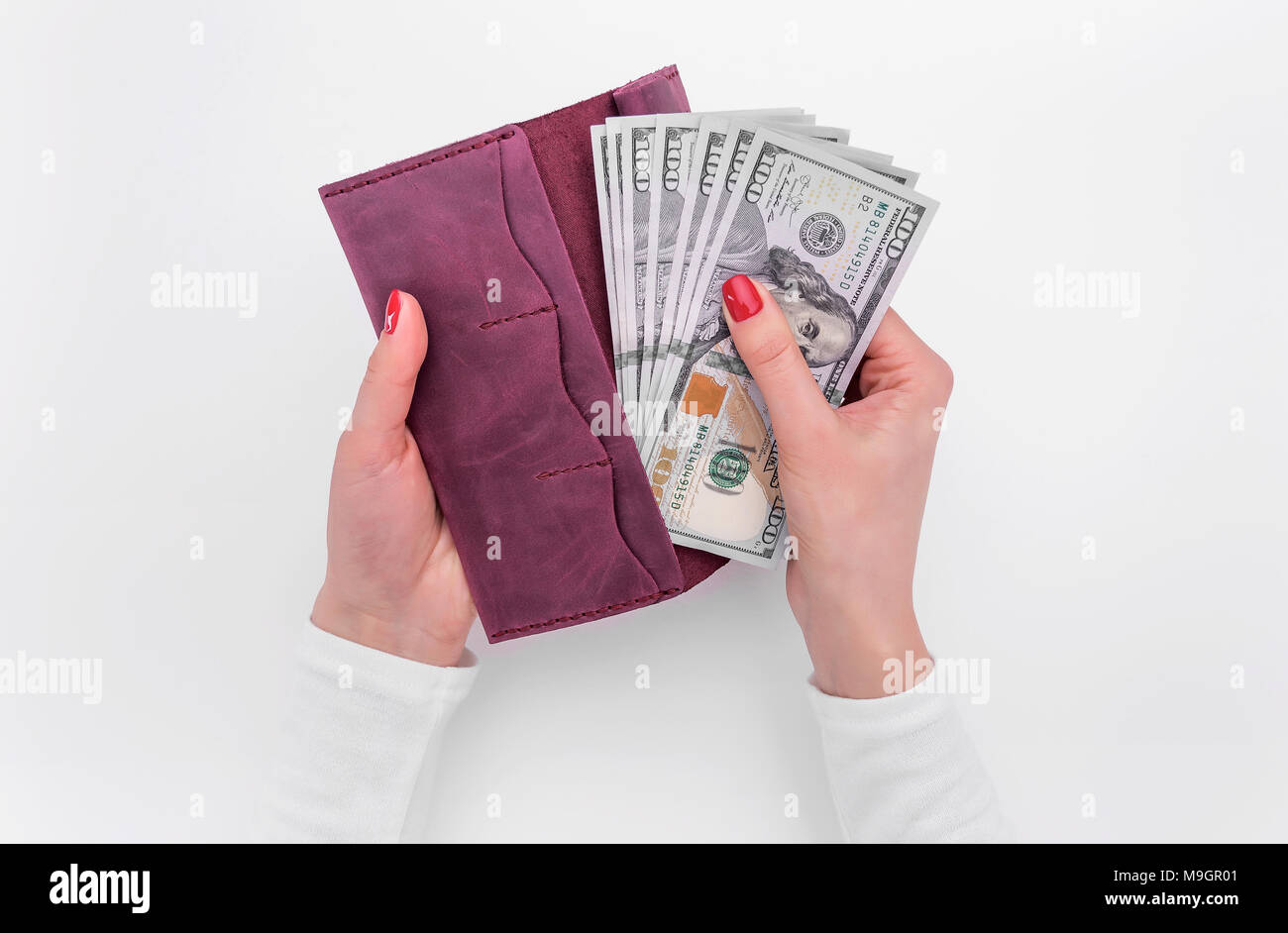 Money and hand hi-res stock photography and images - Alamy