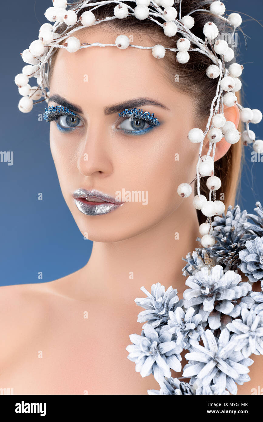 portrait of beautiful charming woman with hair accessory, christmas ...