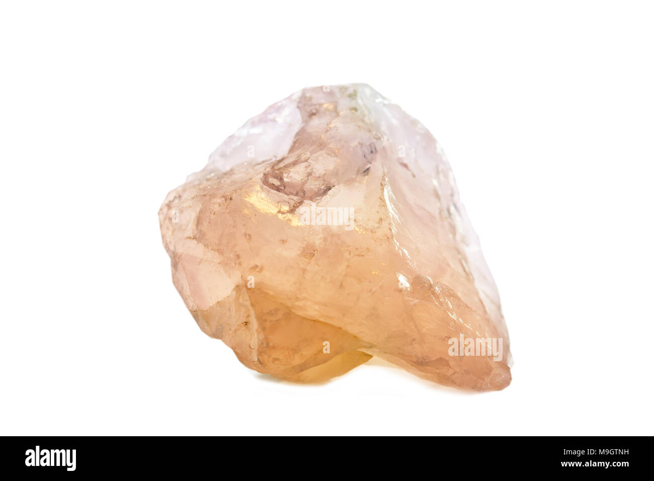 Macro shooting of natural gemstone. Raw mineral rose quartz. Isolated ...