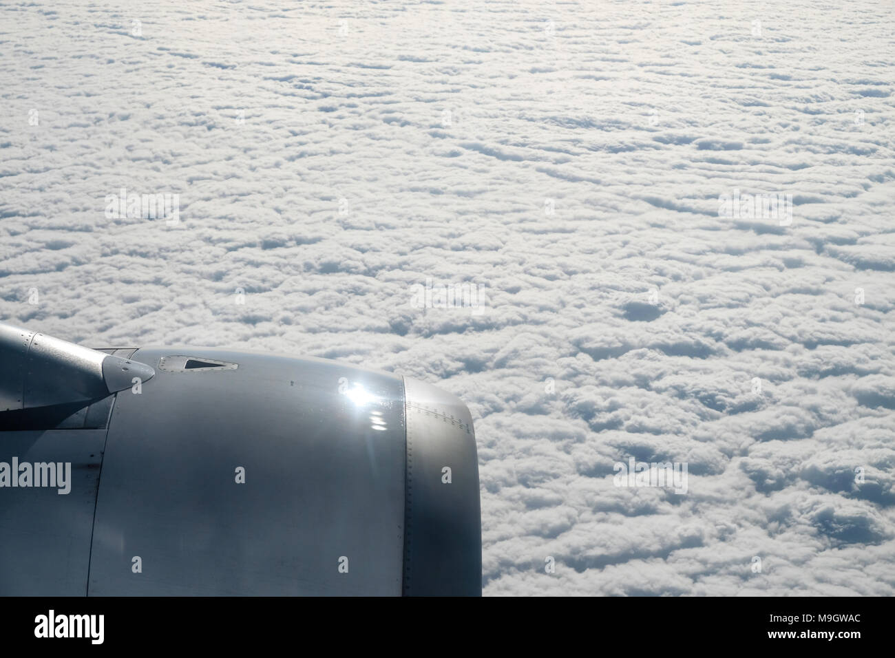 Sky above clouds from airplane window Stock Photo - Alamy