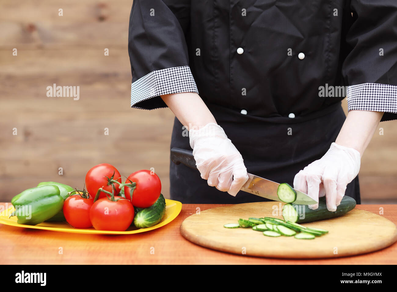 Man cuts pepper salad home hi-res stock photography and images - Alamy