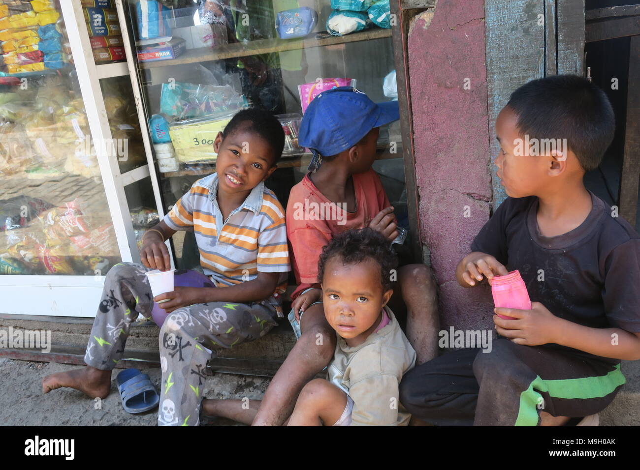 Cute native kid, Madagascar island, Africa in a street of capital ...