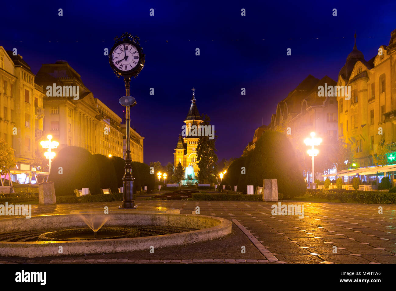 Night view of Victoriei Square on background with Romanian Orthodox ...