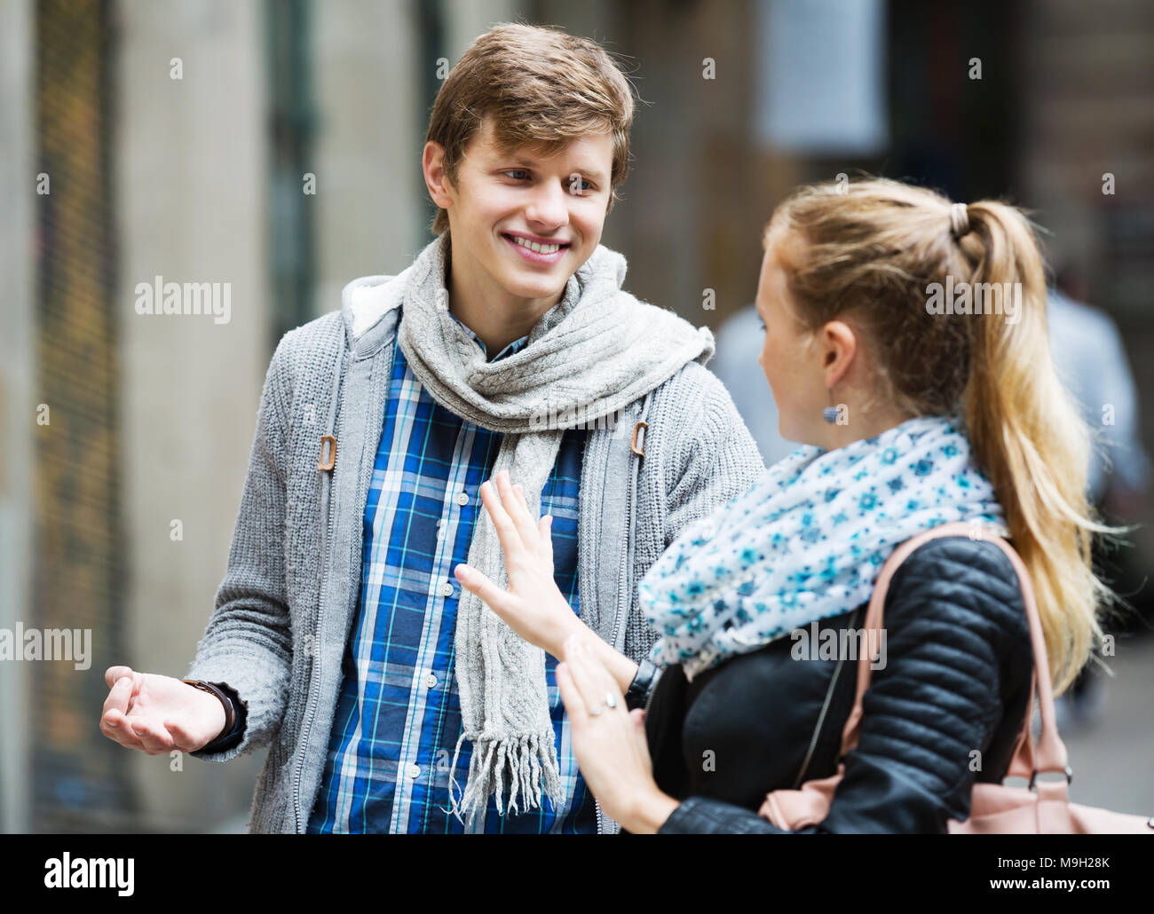 Public harassment: annoying man chasing irritated european girl Stock ...