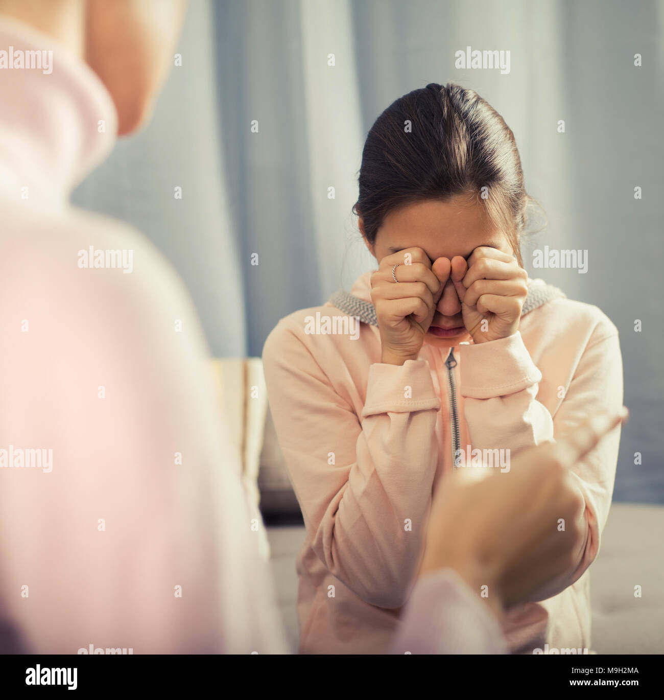 Mother reprimands her daughter for wrong things and bad behavior Stock ...