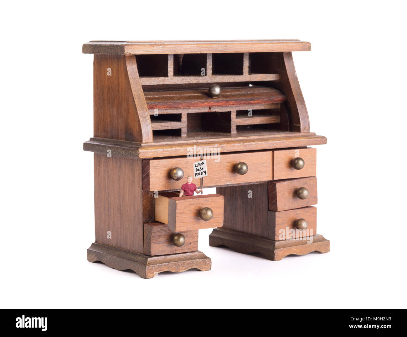 Small vintage wooden desk, small man with sigh - Clean desk policy ...